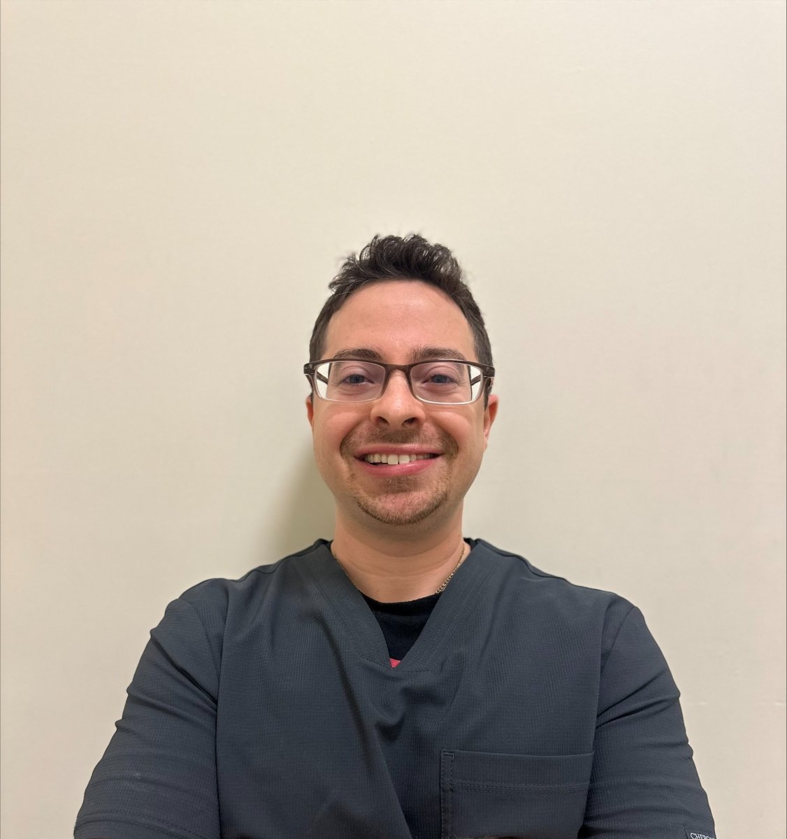 Kosta Kokolis, MS, PT at TheraMotion Physical Therapy